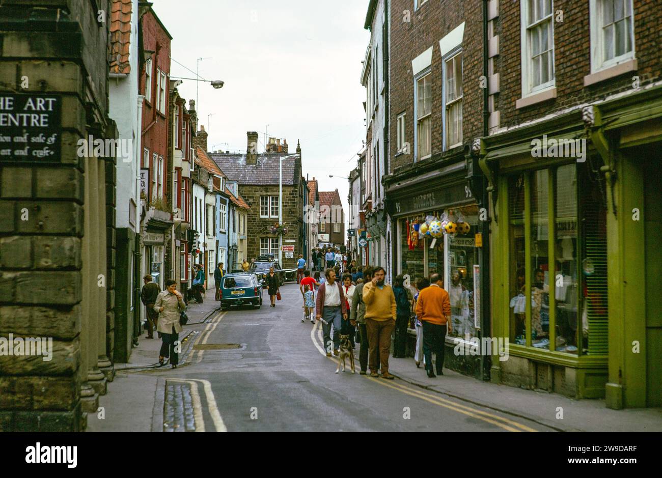 Busy shopping street in town centre, Whitby, north Yorkshire, England ...