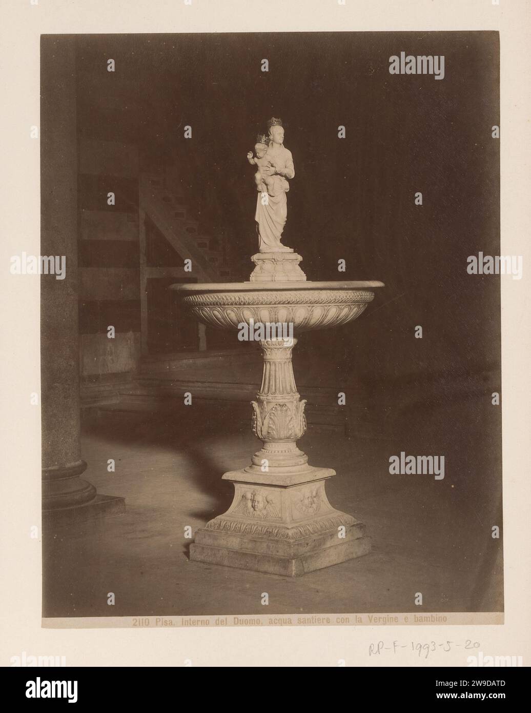 Baptismal font with sculpture by Maria with child in the Dom of Pisa ...
