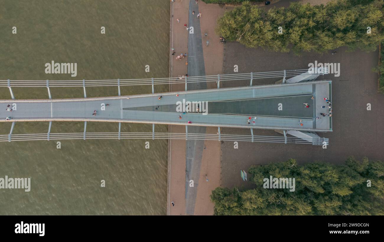 An aerial view of a bridge with people walking across it Stock Photo ...