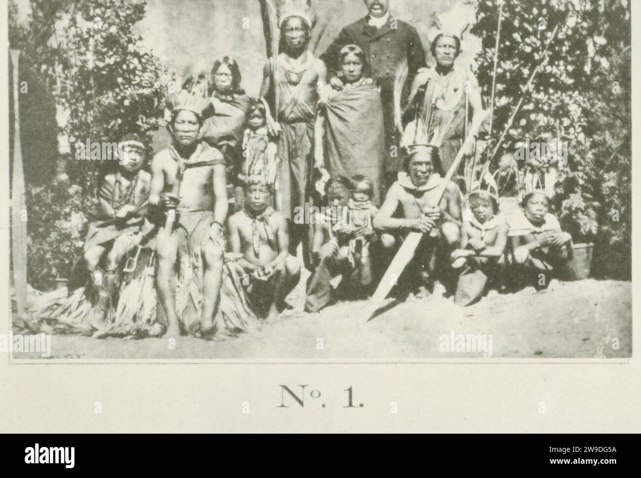 Group portrait of Surinamese Arowaks and Caribbean, and a European man ...