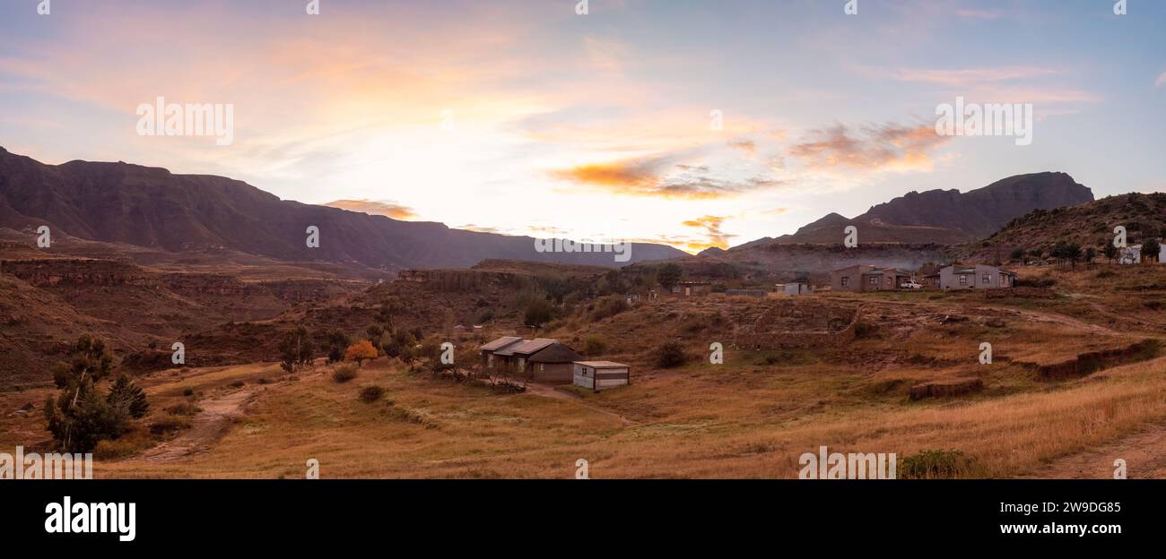 Panorama of a remote village in the Lesotho mountains at sunrise ...