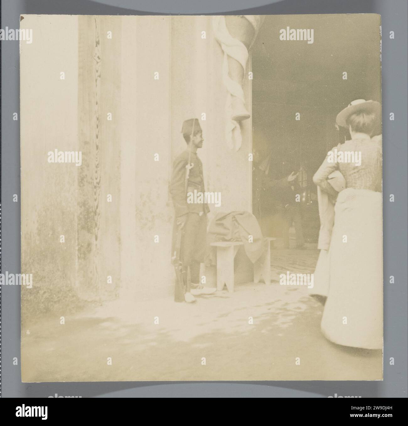 Militarily guarding access to a building (or a pavilion at the ...