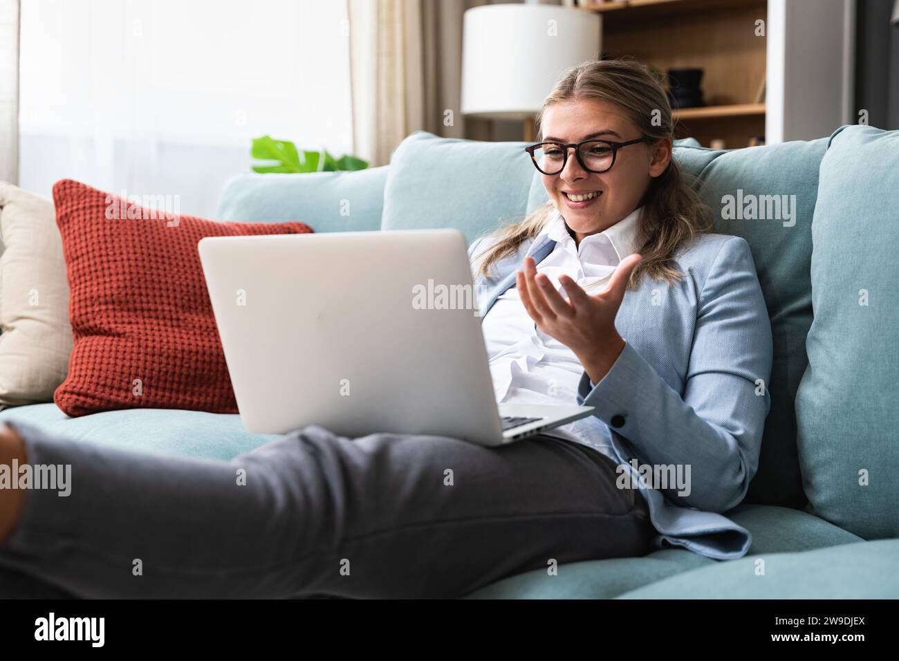 Success woman freelancer is working on a new project on laptop. Work ...