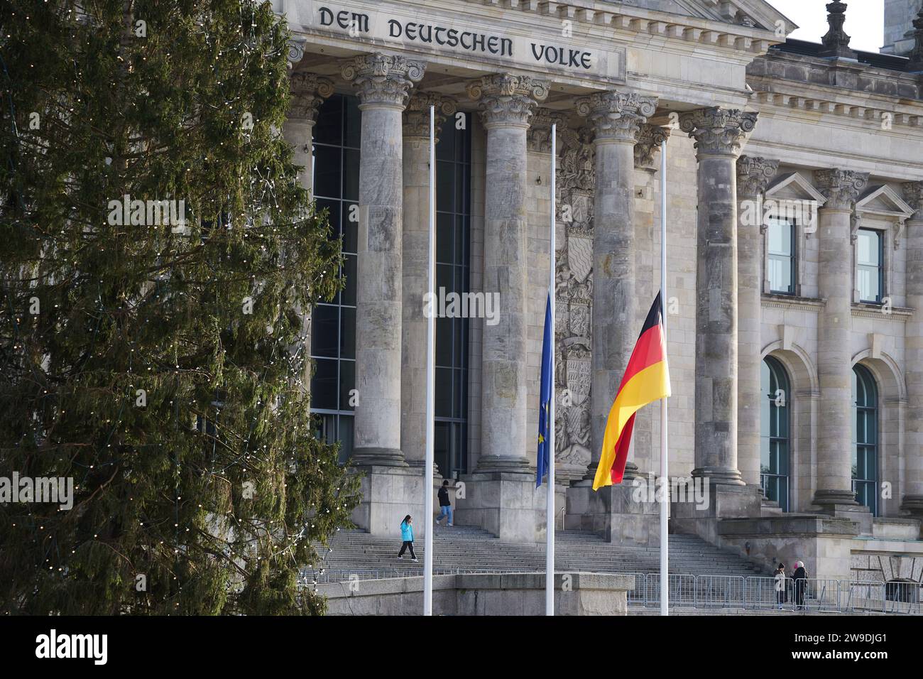 Berlin, Germany. 27th Dec, 2023. The German and EU flags are flown at ...