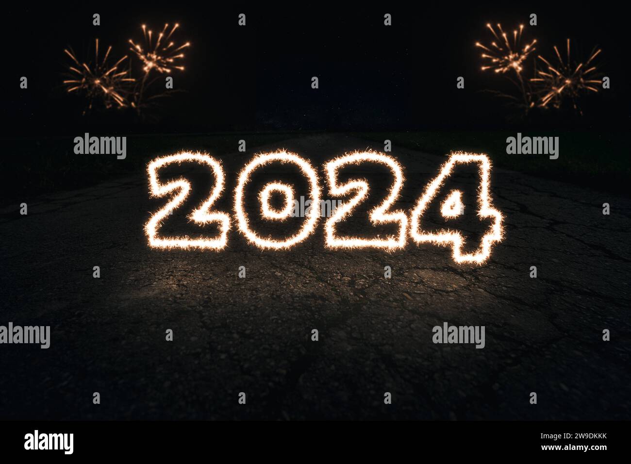 December 27, 2023: The year 2024 glows on a dark street. 2024 written ...