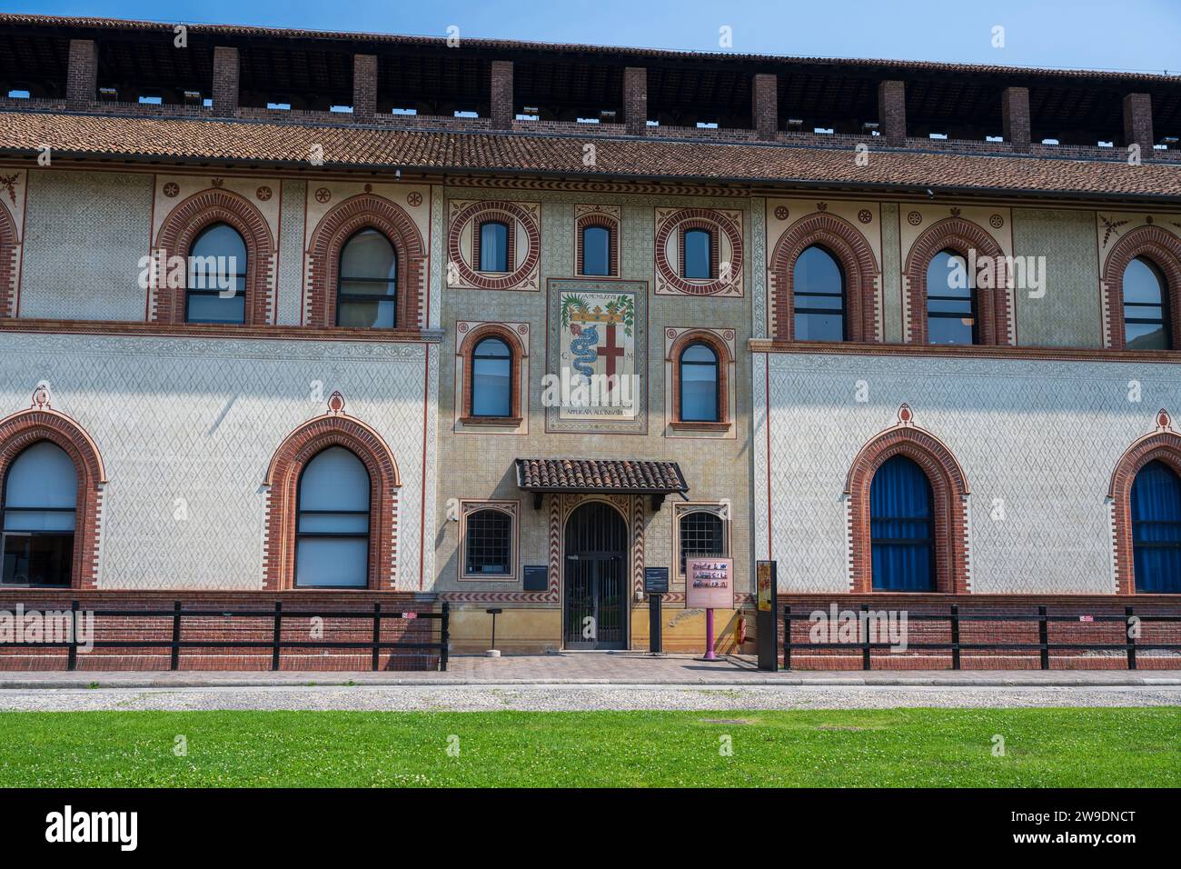 This majestic three-story building features large windows, creating a ...