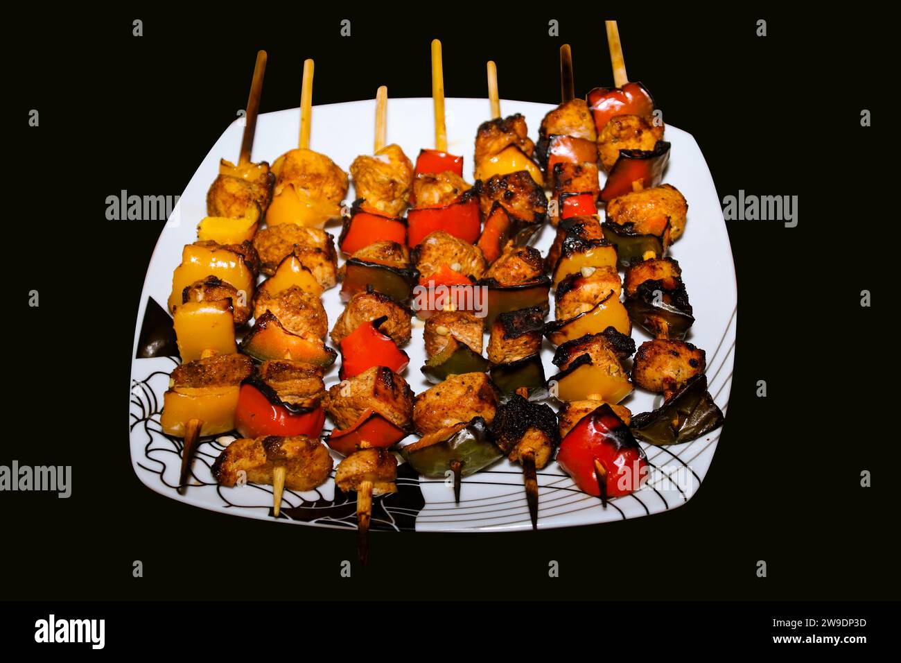 Yummy barbecue have a good meal. Cooking a group of Brochettes on a ...