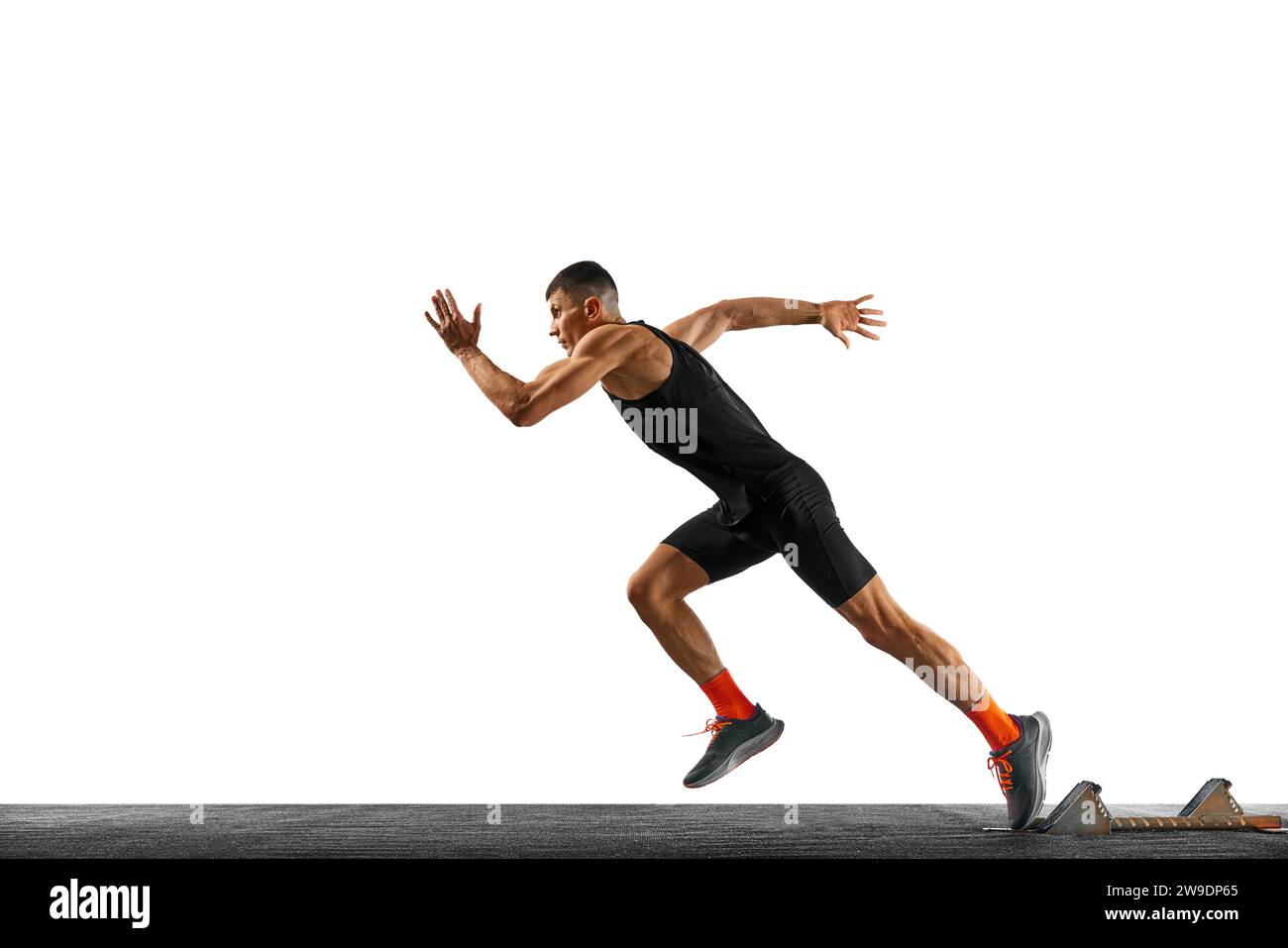 Side view body size portrait of young sportsman, professional runner ... Side view body size portrait of young sportsman, professional runner ...