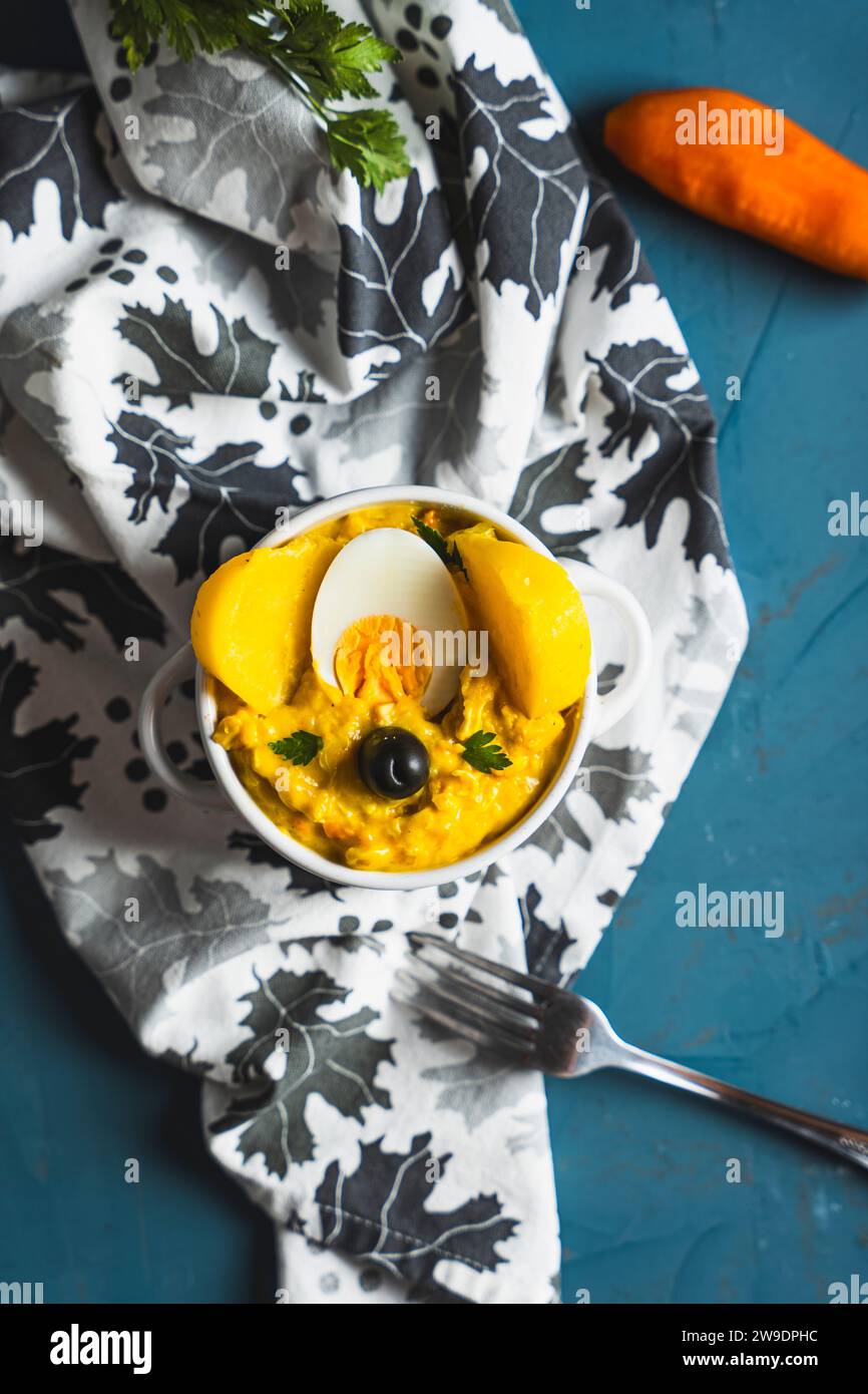 Traditional dish seen from above, called aji de gallina with a portion ...
