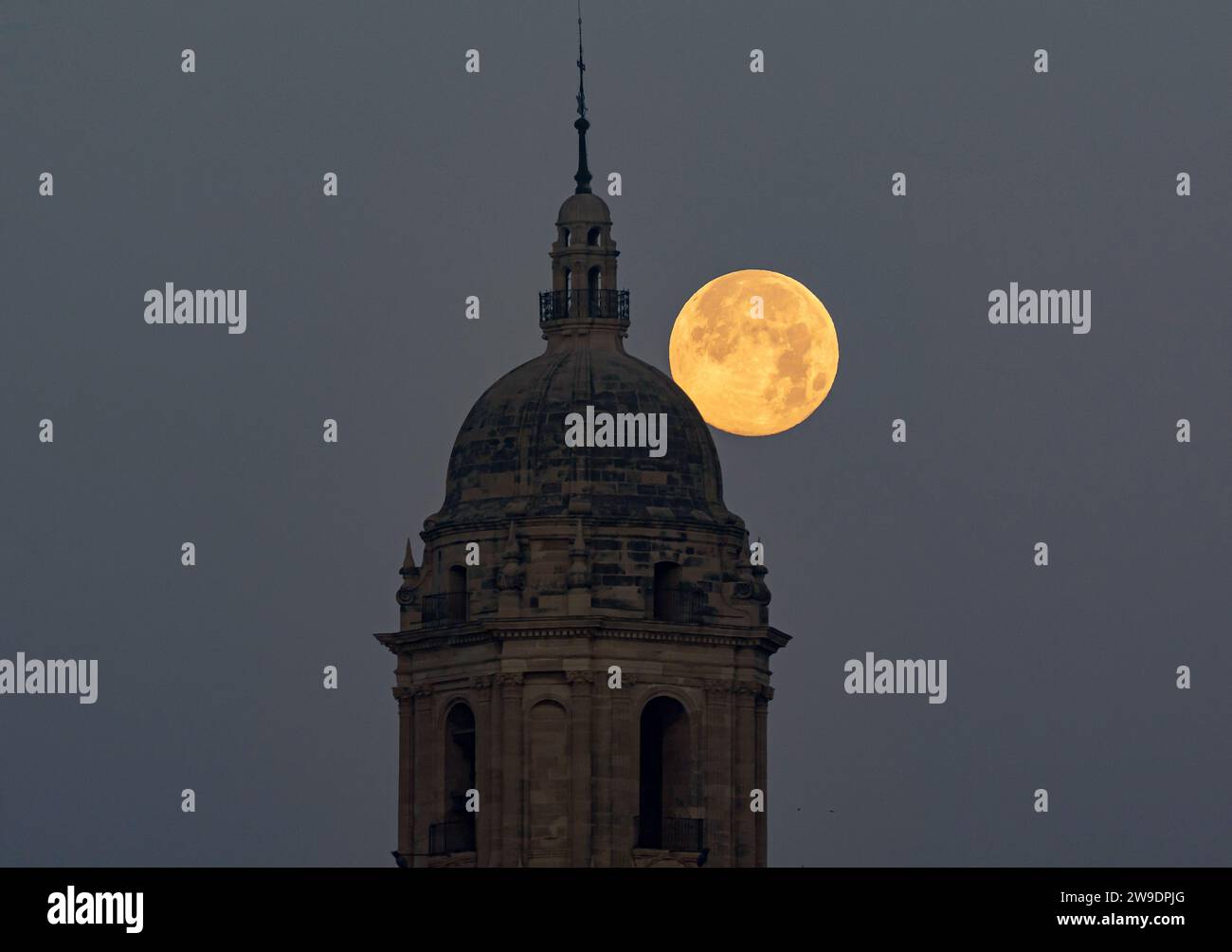 The full moon of December, known as the 'cold moon', is seen in the sky ...