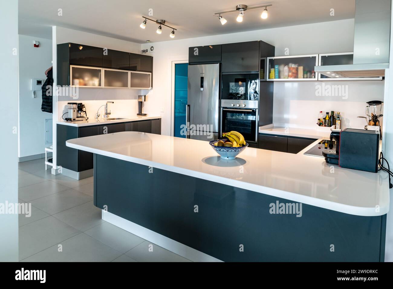 an image of a newly fitted American style open kitchen in a luxury ...