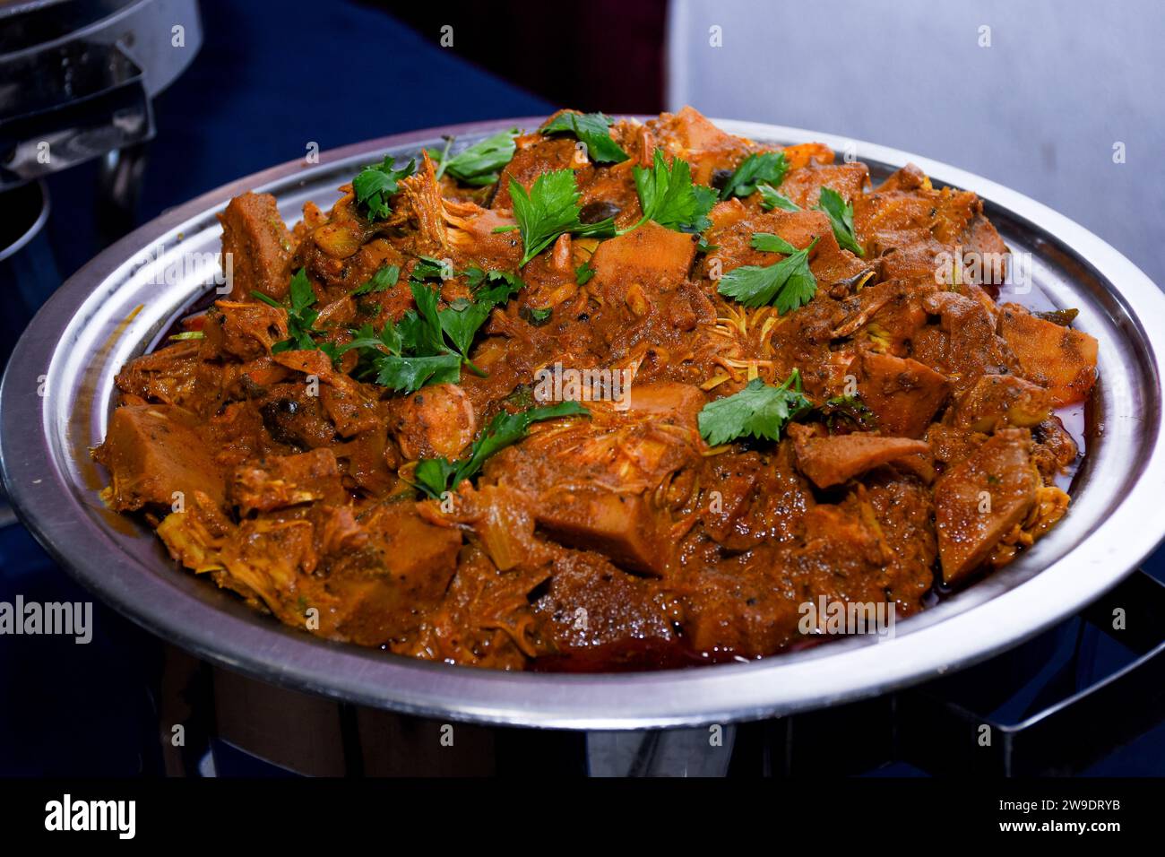 Tasty butter chicken curry dish from Indian cuisine in Buffet, Orange ...