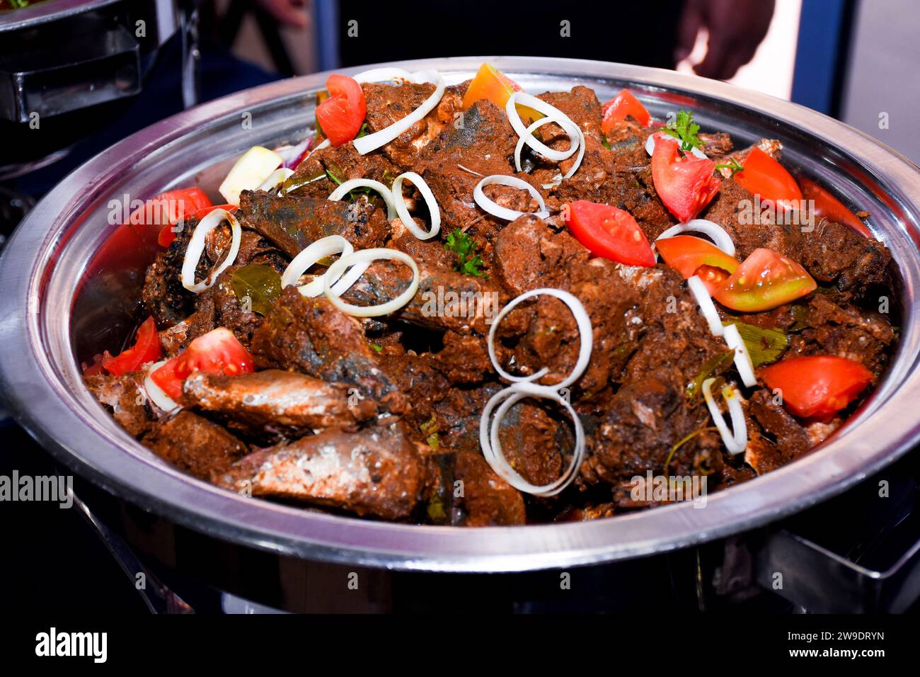 Sri Lankan special deviled fried fish buffet Stock Photo - Alamy