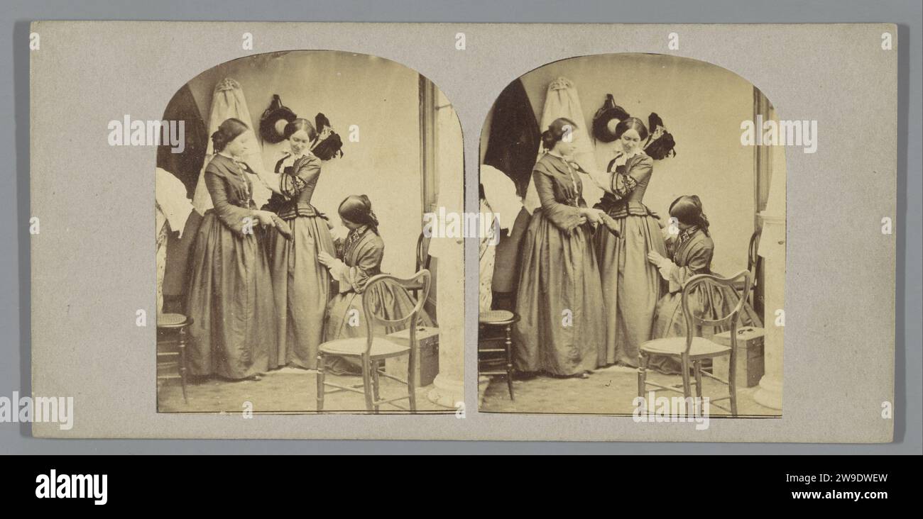 Three women pin each other's dresses, 1857 - 1863 stereograph paper. cardboard albumen print ...