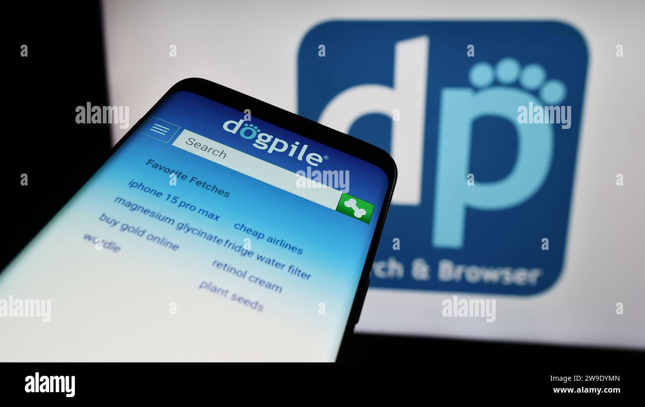 Mobile phone with website of metasearch engine Dogpile in front of ...