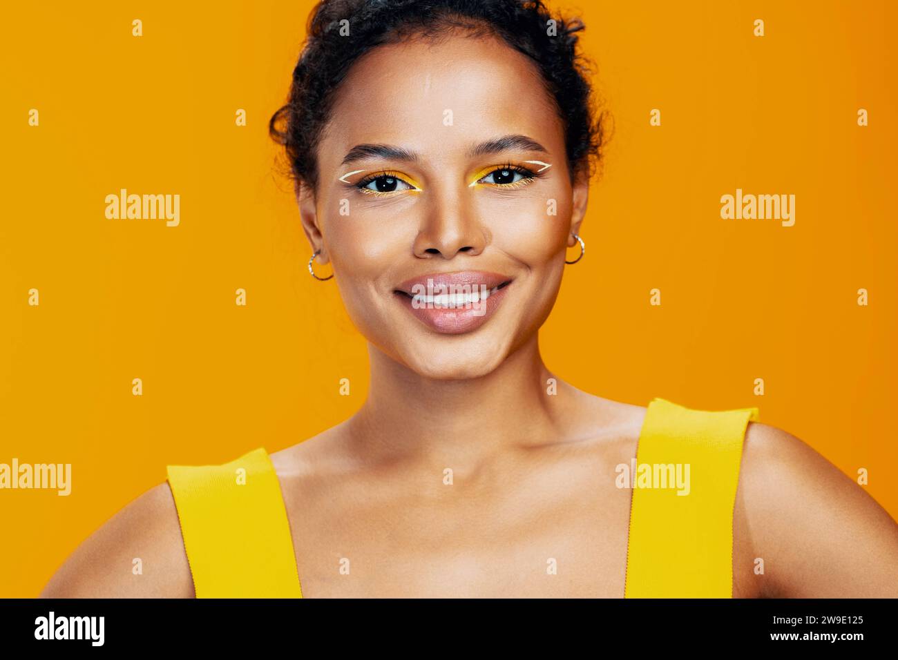 Beauty woman face colourful make-up african Stock Photo - Alamy