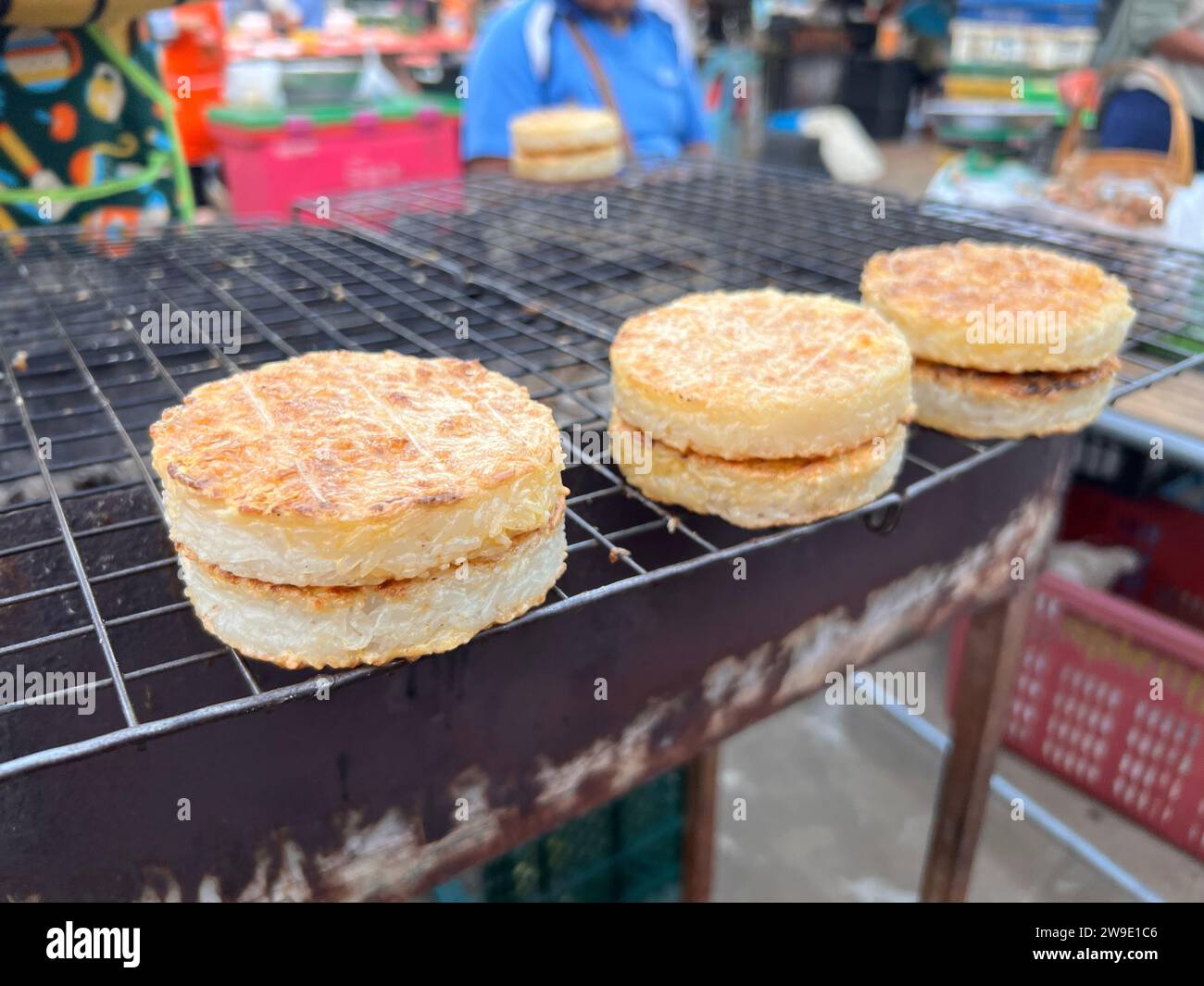 Grilled sticky rice dipped in egg Sticky rice , street Thai food winter ...