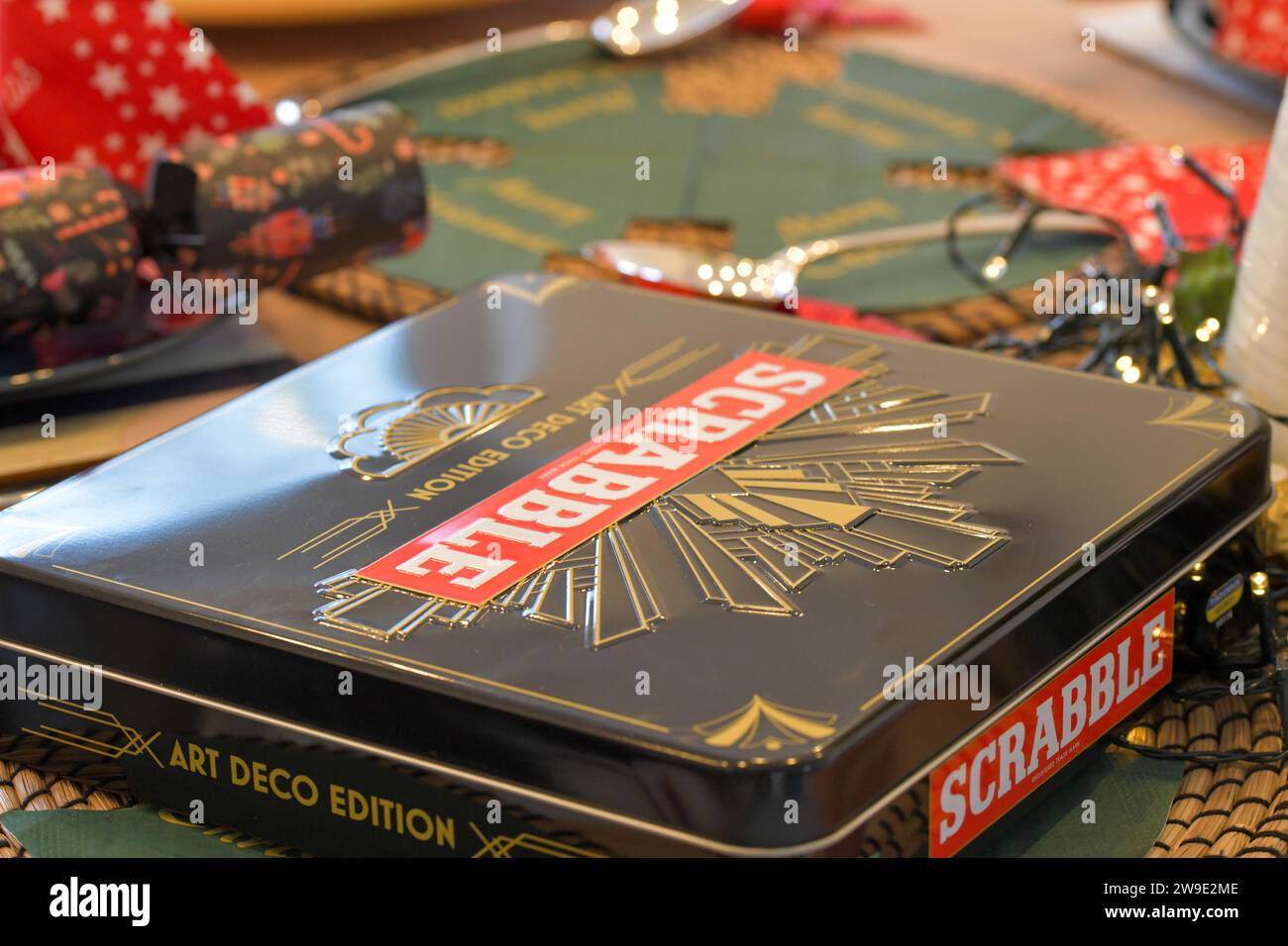 An Art Deco Scrabble board special edition on the corner of a festively ...