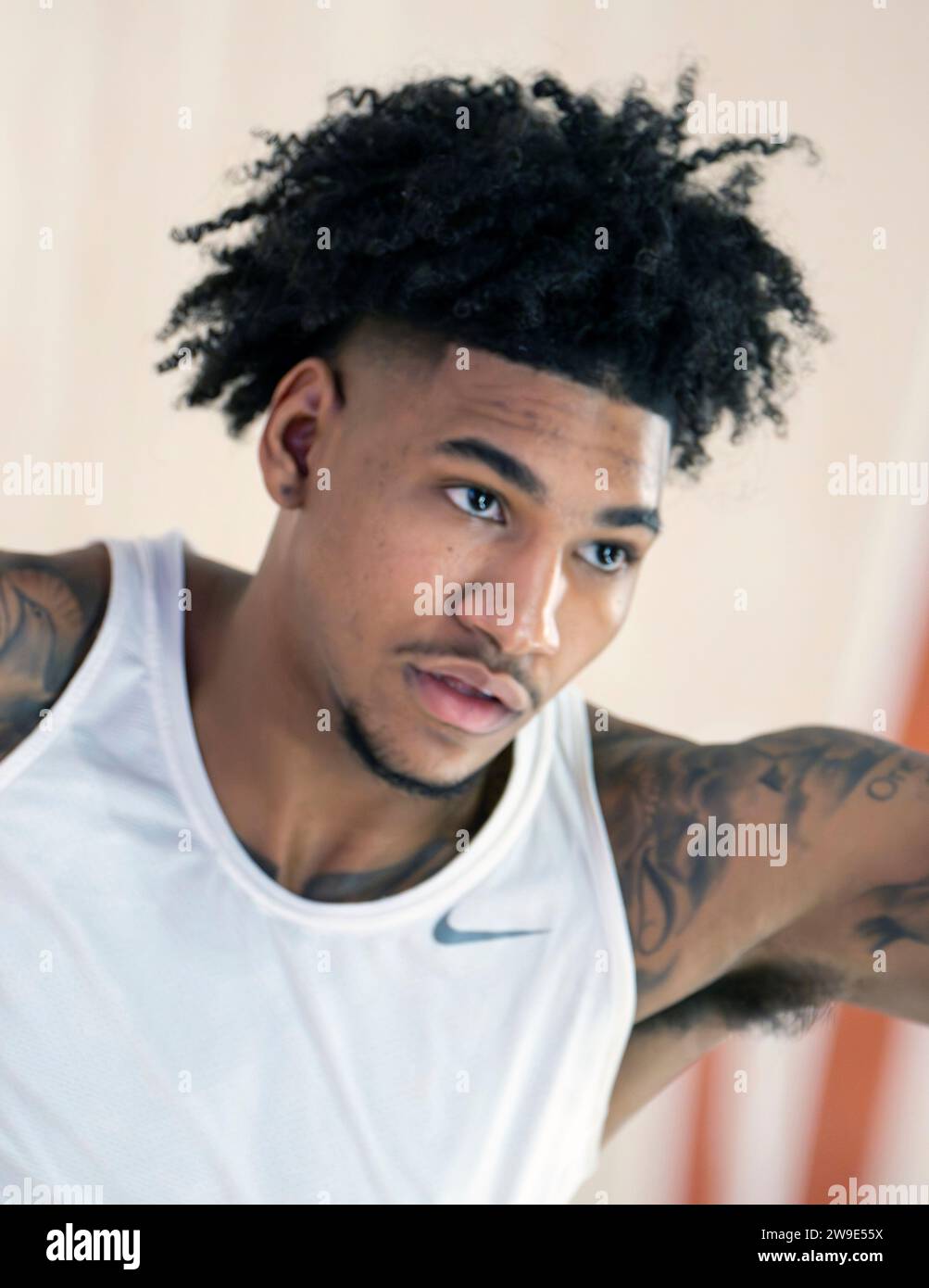 Texas forward Dillon Mitchell looks on before an NCAA college ...