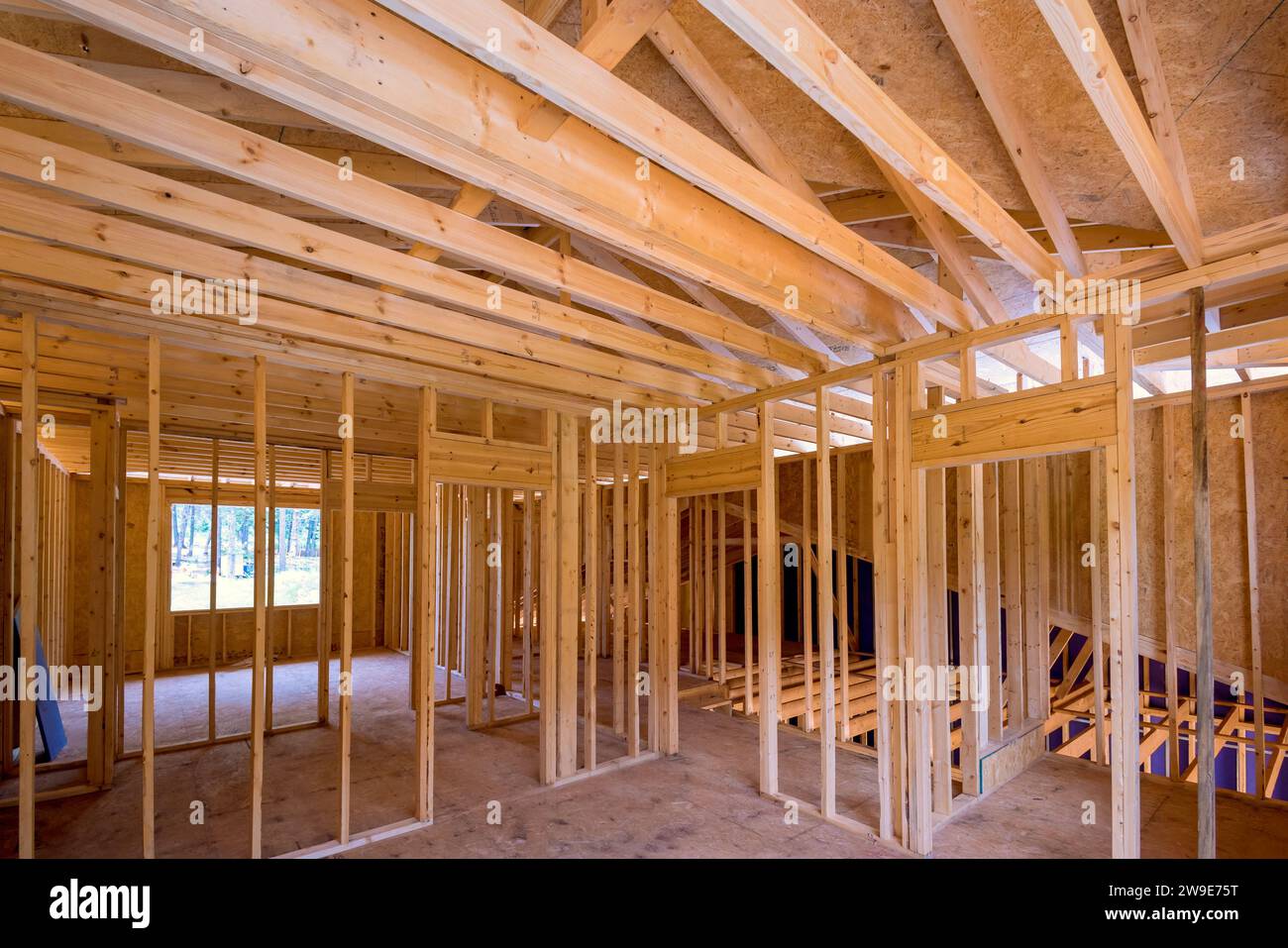 Framing of new unfinished residential home under construction is made ...