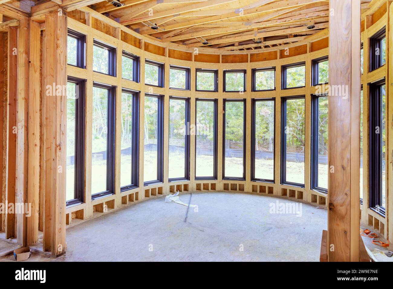 New unfinished residential home under construction framing of wood ...