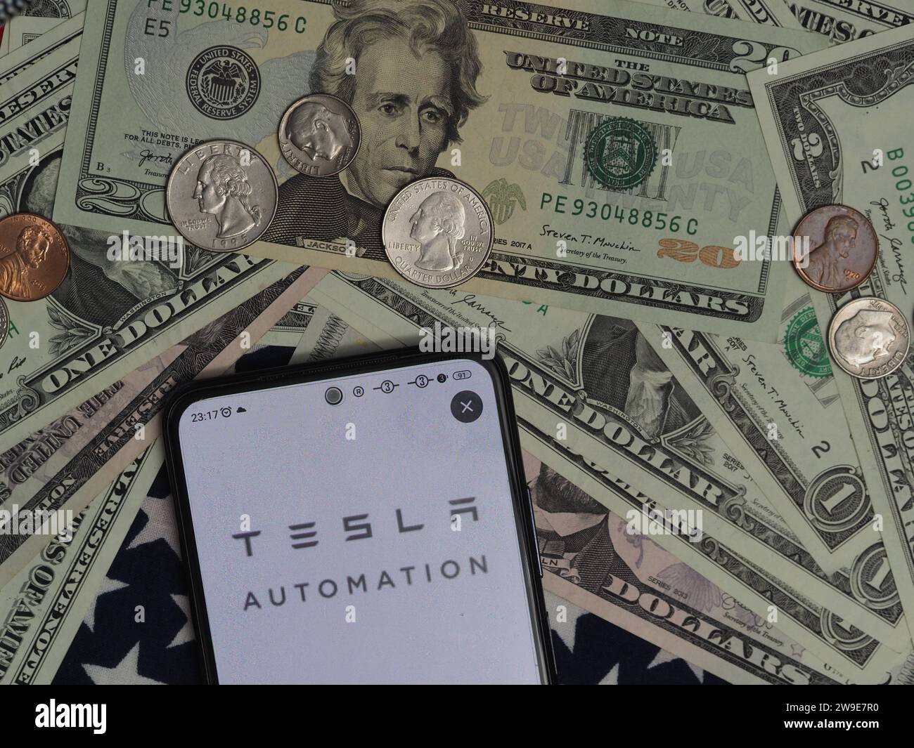 In this photo illustration, a Tesla Automation GmbH logo seen displayed ...