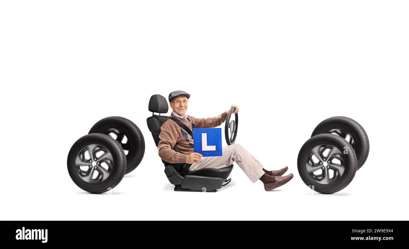 Cheerful senior holding a learner plate and driving on four wheels ...