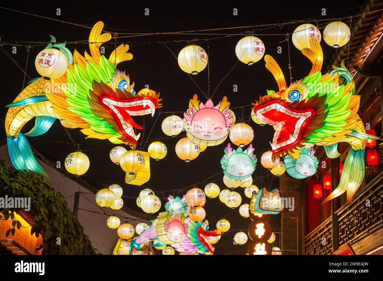 Nanjing, China. 27th Dec, 2023. Tourists are viewing lanterns at the ...