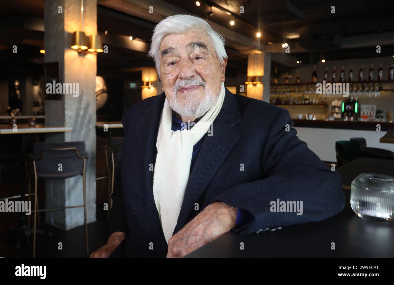 Munich, Germany. 10th Dec, 2023. Mario Adorf, actor, sits before the ...