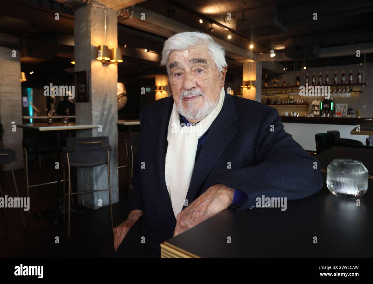 Munich, Germany. 10th Dec, 2023. Mario Adorf, actor, sits before the ...