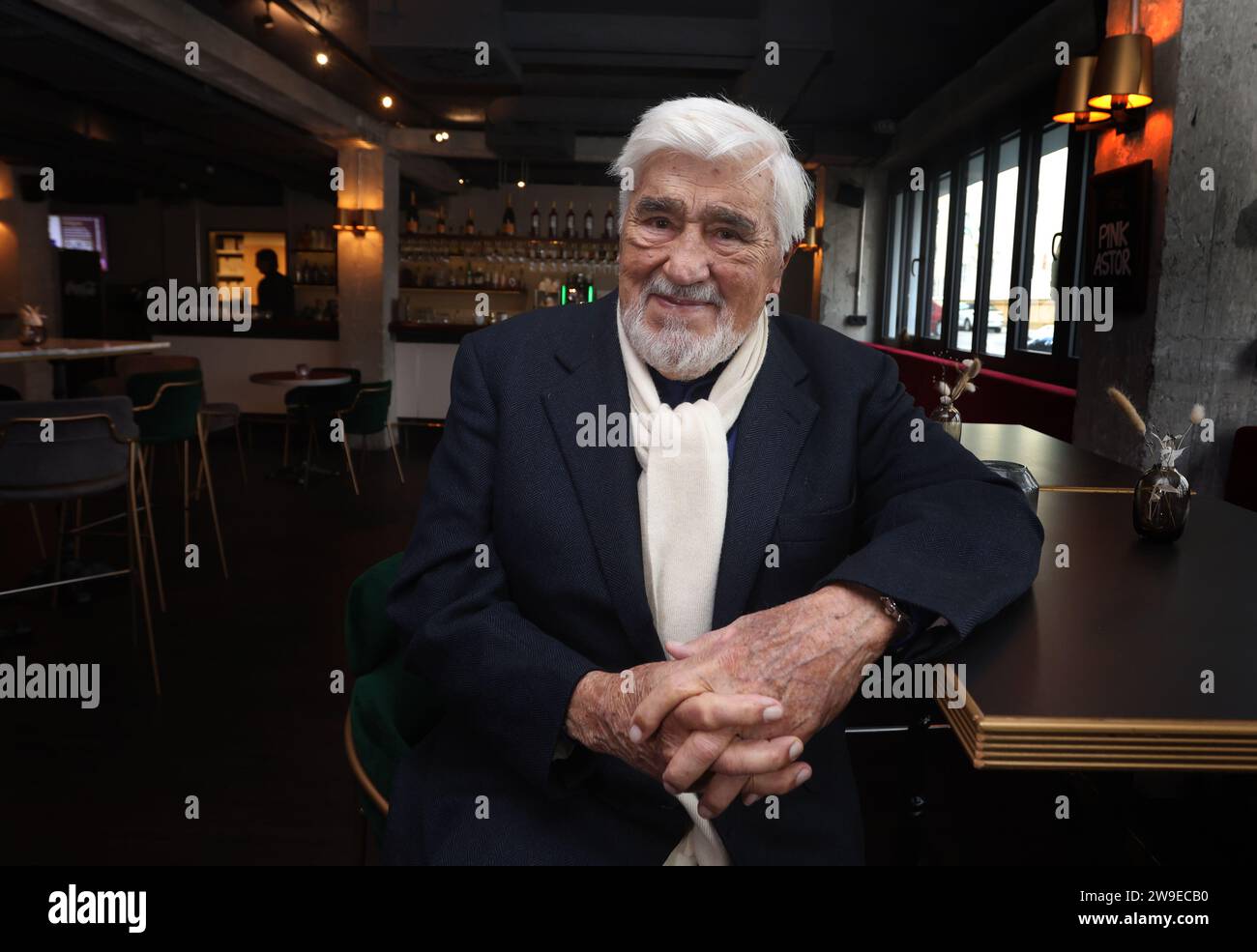 Munich, Germany. 10th Dec, 2023. Mario Adorf, actor, sits before the ...