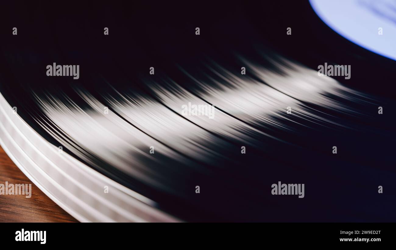 Hypnotic spin of vinyl disc. Timeless cinematic charm of analog music ...