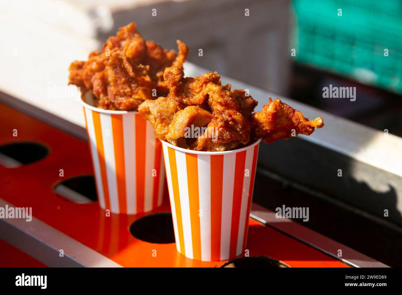 Karaage style chicken at a street stand in Tokyo. Karaage is a very ...