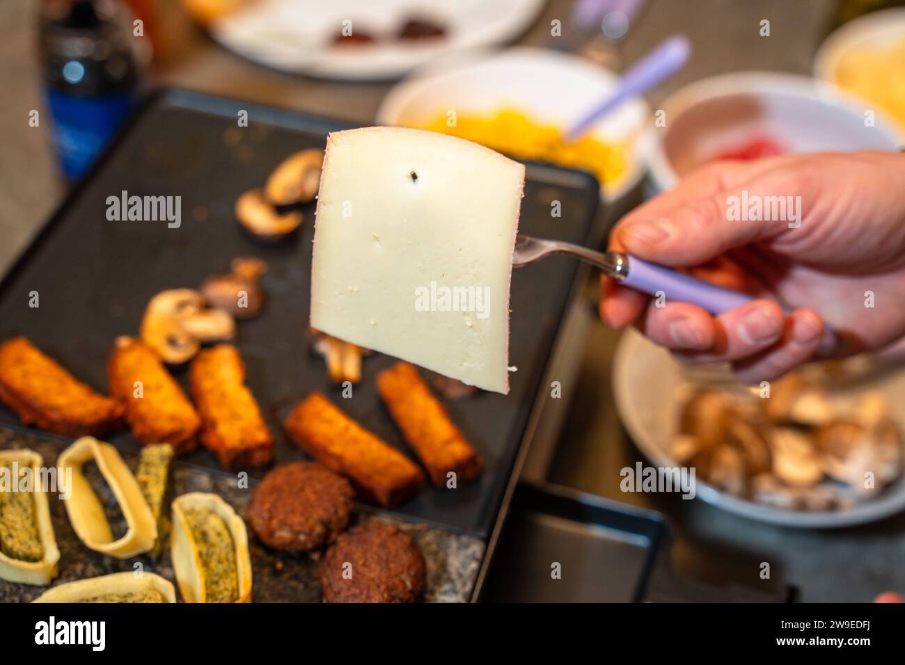 Raclette käse hi-res stock photography and images - Alamy