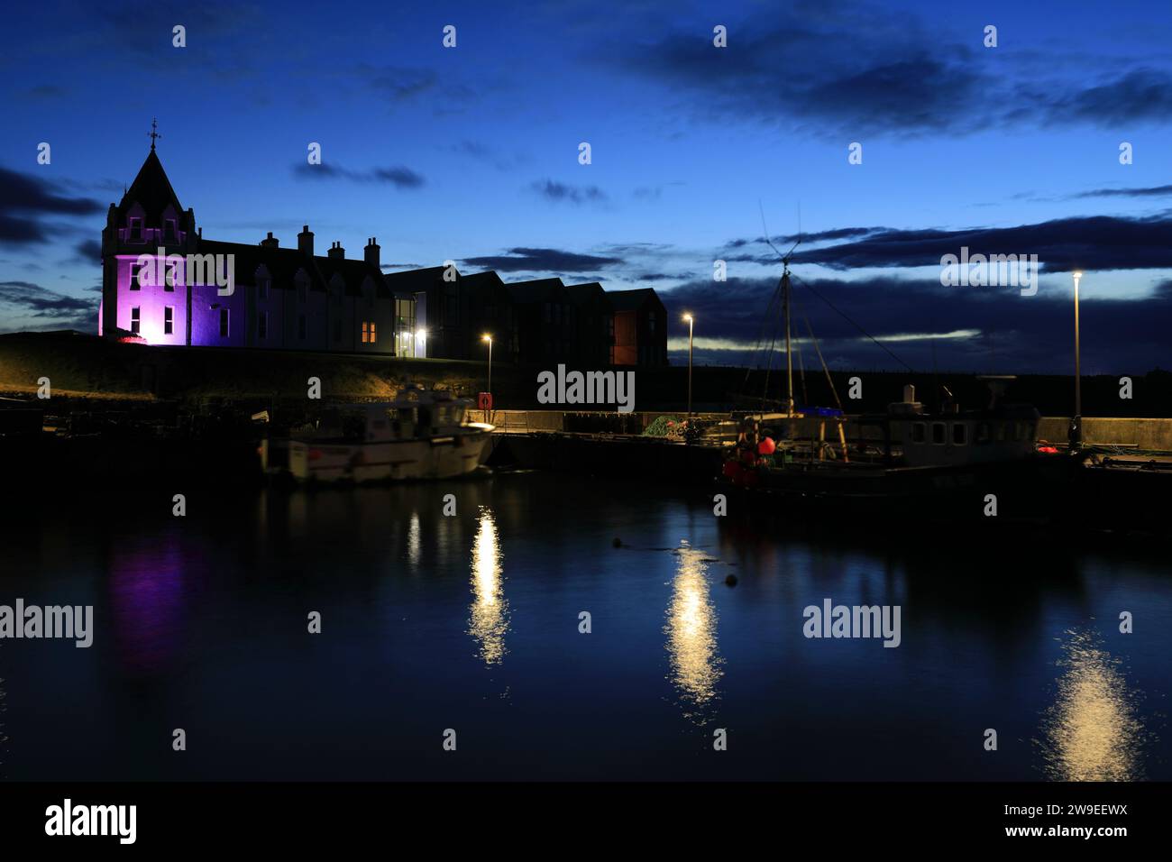 Fishing boats in the harbour at John O Groats village, North coast of ...