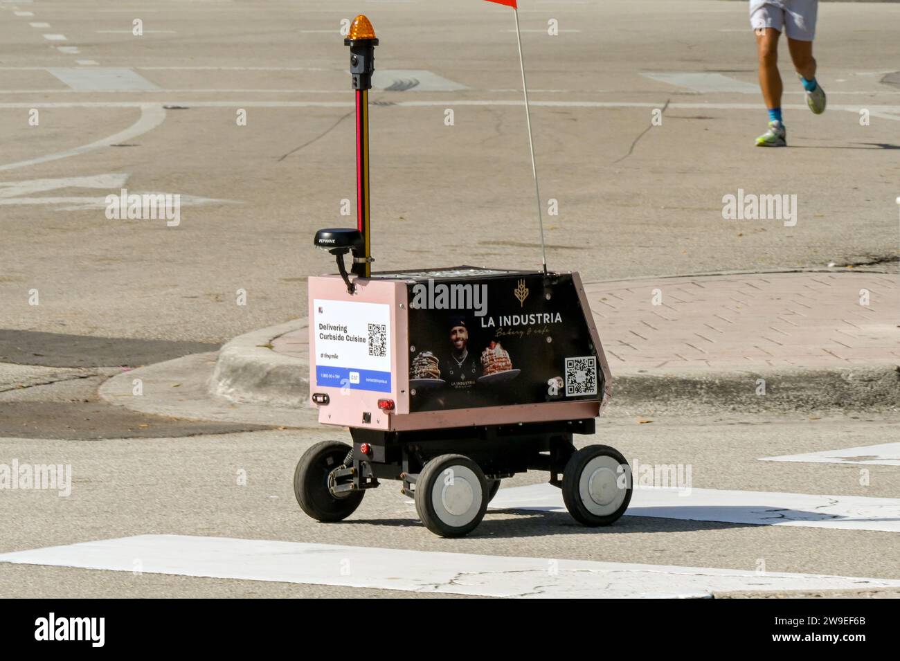 Miami, Florida, USA - 5 December 2023: Remote controlled robot delivery ...