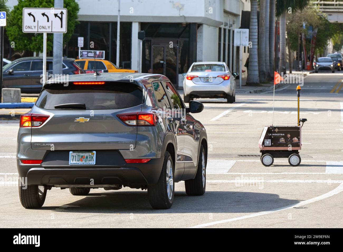 Miami, Florida, USA - 5 December 2023: Remote controlled robot delivery ...