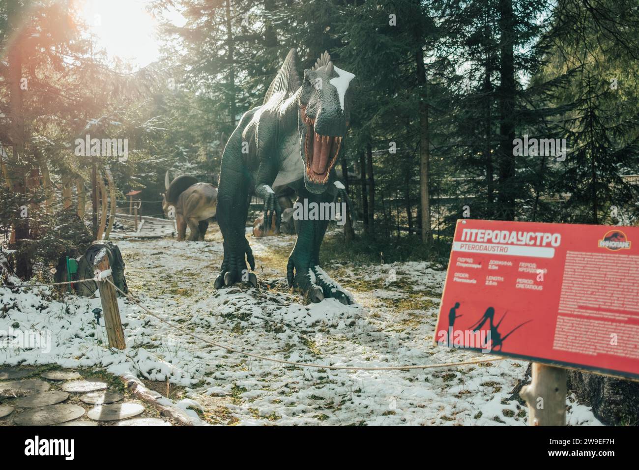 Bukovel, Ukraine - December 2023. Attraction statue of dinosaurs model ...