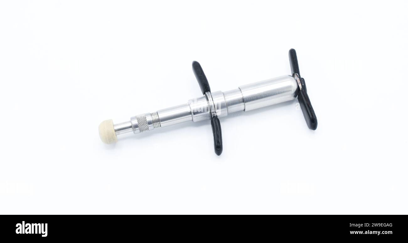 Chiropractic Activator Tool isolated on white background. spine and ...