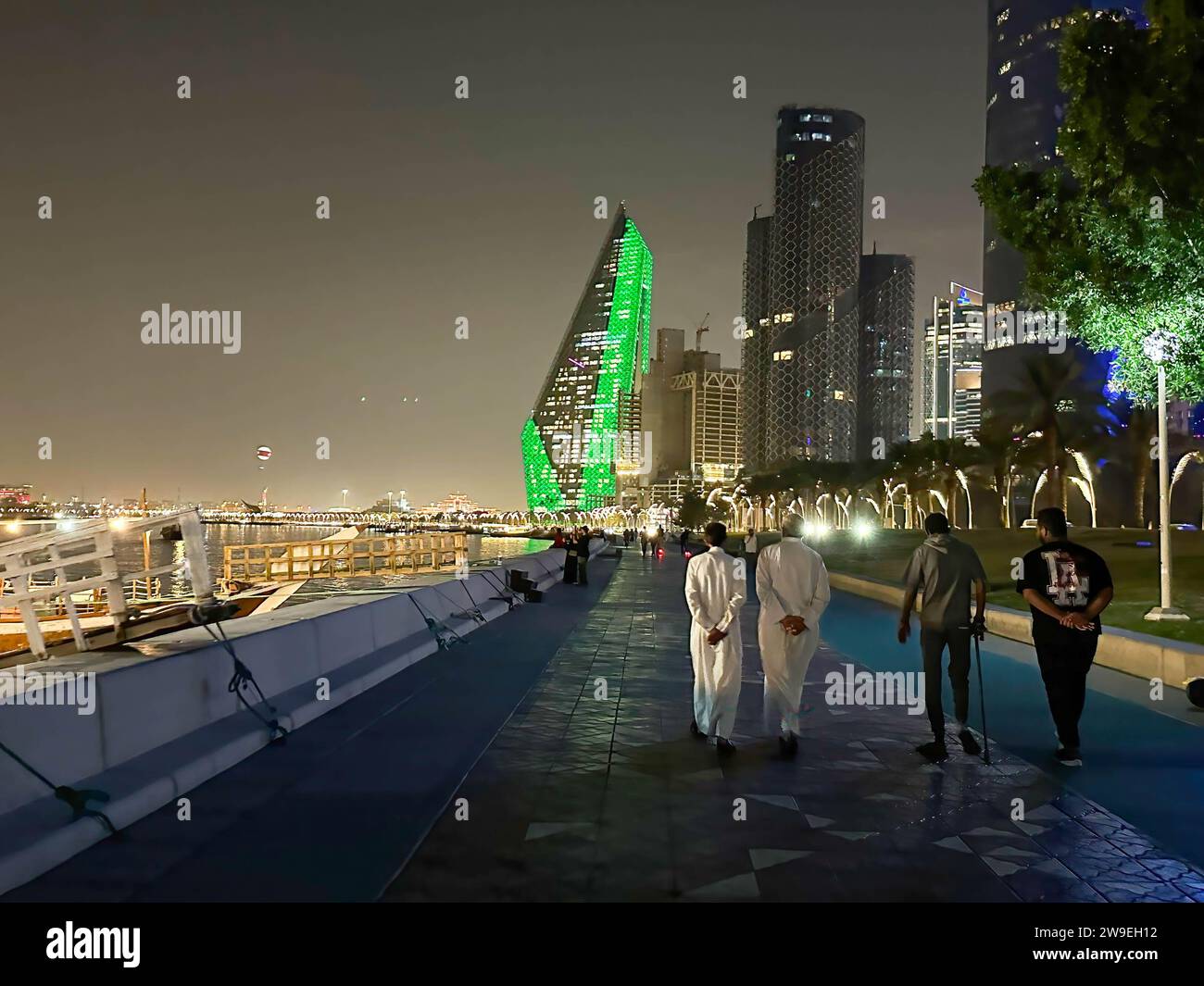 Doha, Qatar. 27th Dec, 2023. People seen walking on the seaside ...