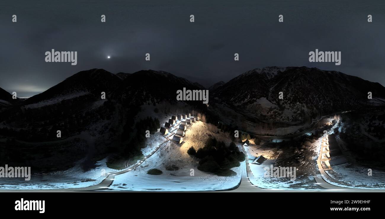 Aerial 360 degree view of A Frame cabins on hill at night in the winter ...