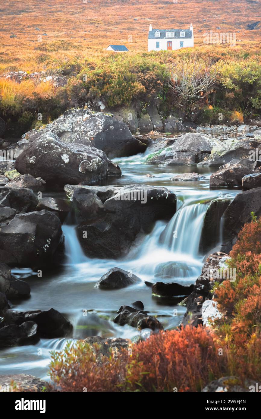 Scenic landscape view of a lone white croft house cottage at Sligachan ...