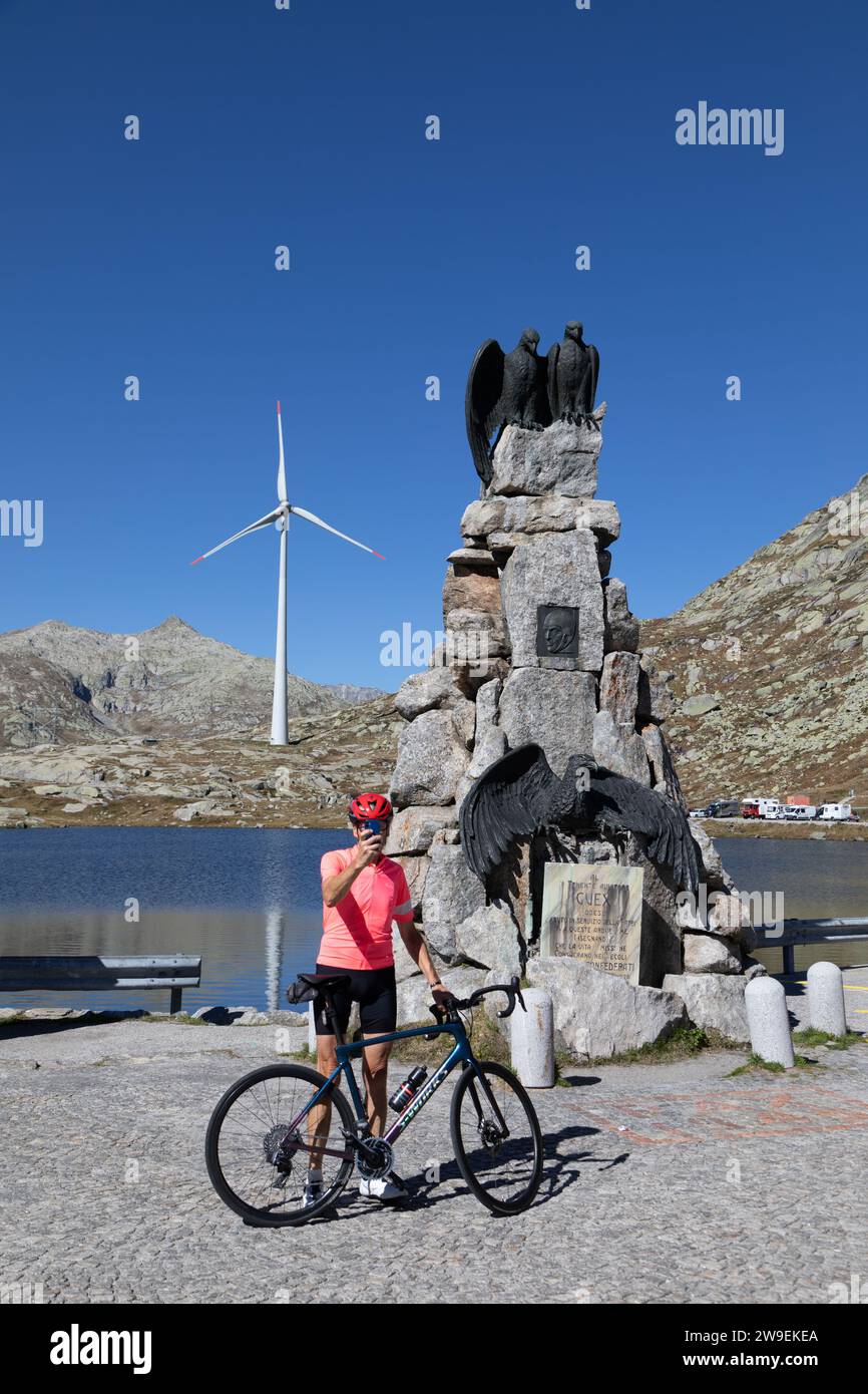 Man with a bicycle taking a self portrait at the Memorial for the ...
