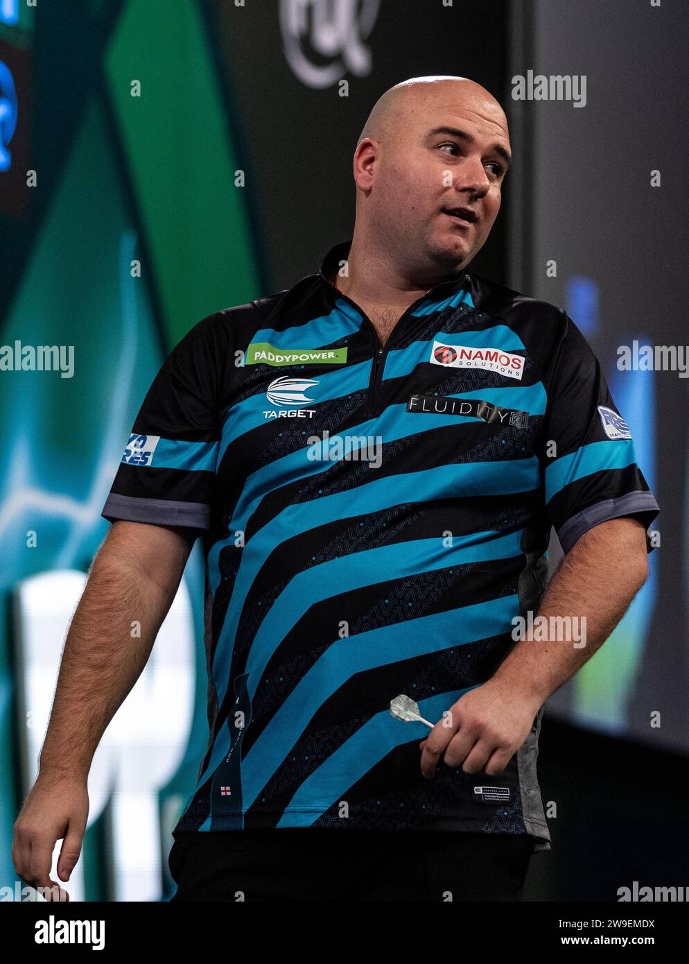 Rob Cross celebrates winning his match against Jeffrey de Graaf during ...