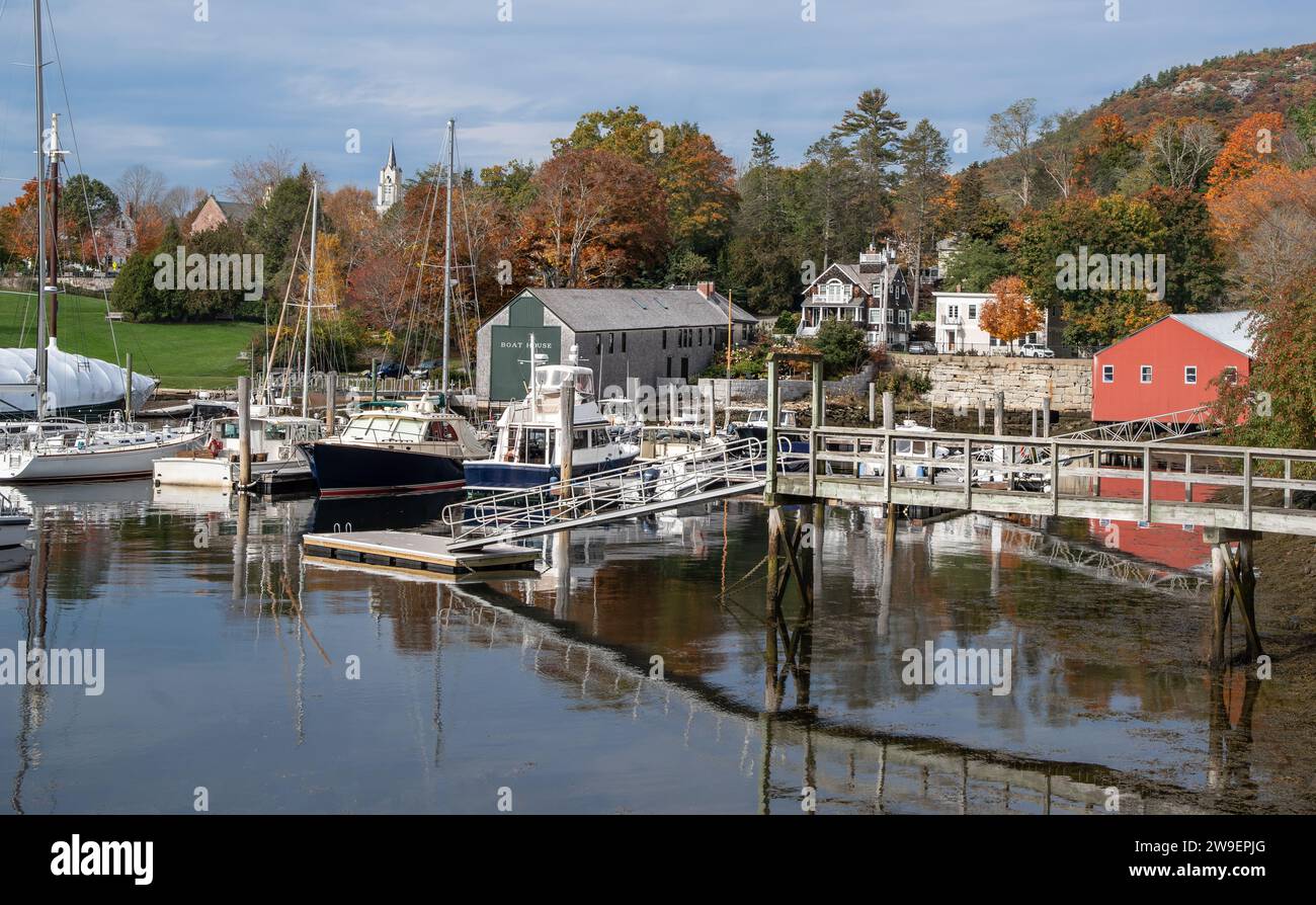 New England Harbor in Autumn Fall colors decorate the waterfront at a ...