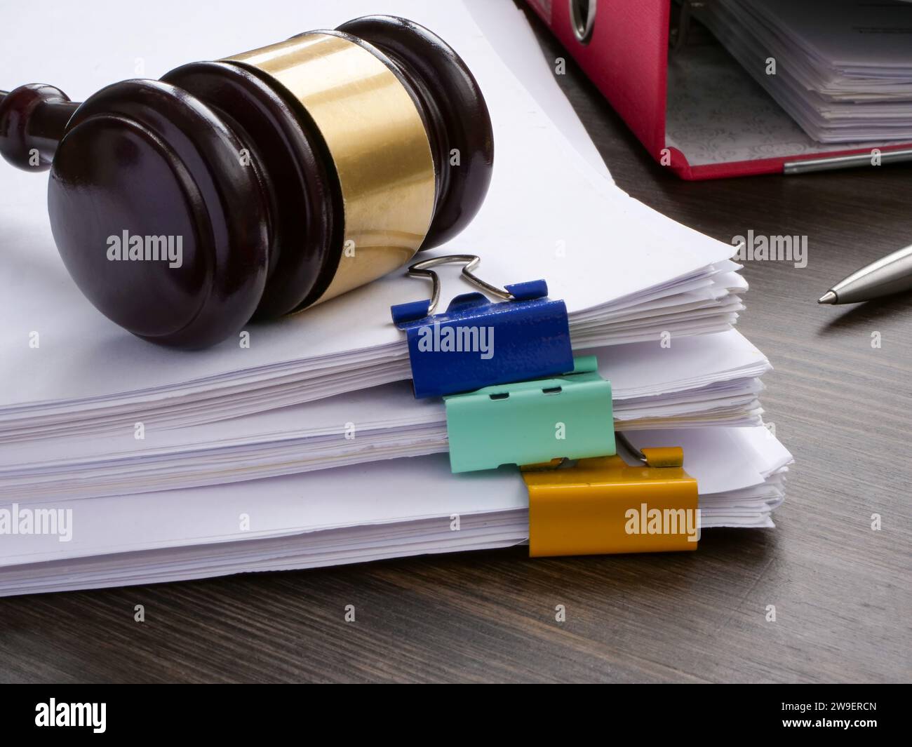 A stack of accounting papers and gavel. Financial white-collar crime ...