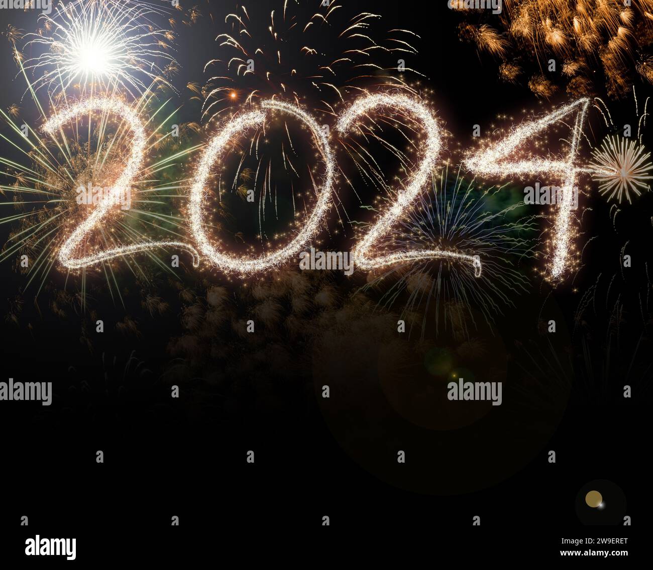 Sparkling fireworks forming the number 2024 against a night sky ...