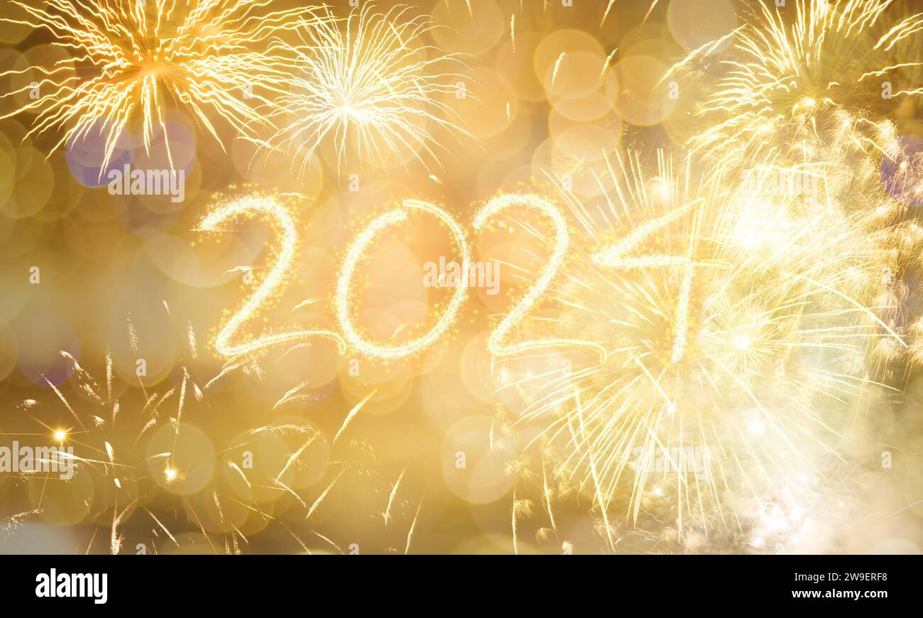 Bright and colorful 2024 fireworks celebration with sparkling effects ...