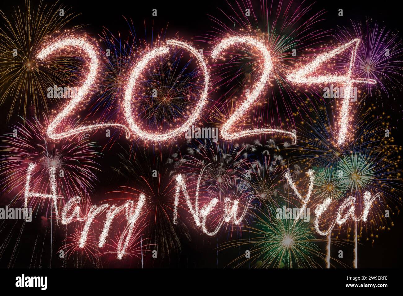 Vibrant fireworks celebrating the new year 2024 in the night sky Stock ...