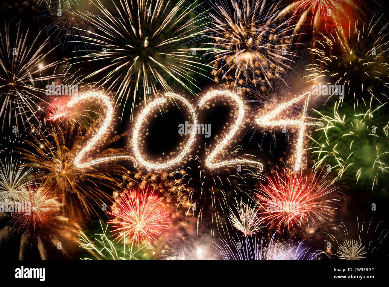 Vibrant fireworks display with 2024 sparkling in the night sky Stock ...